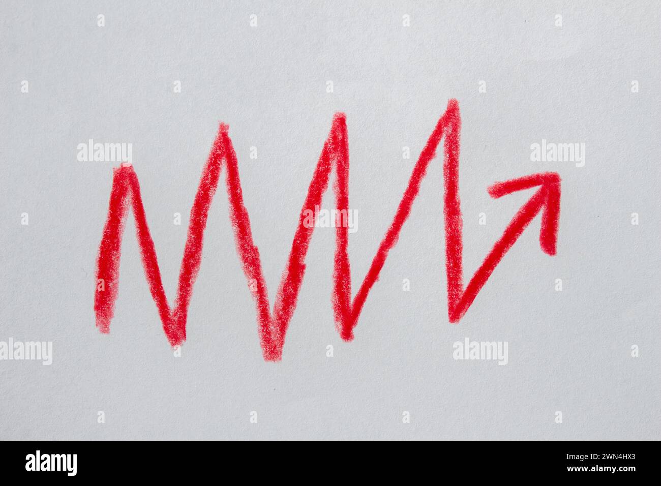 Hand drawn red arrow on white paper Stock Photo - Alamy