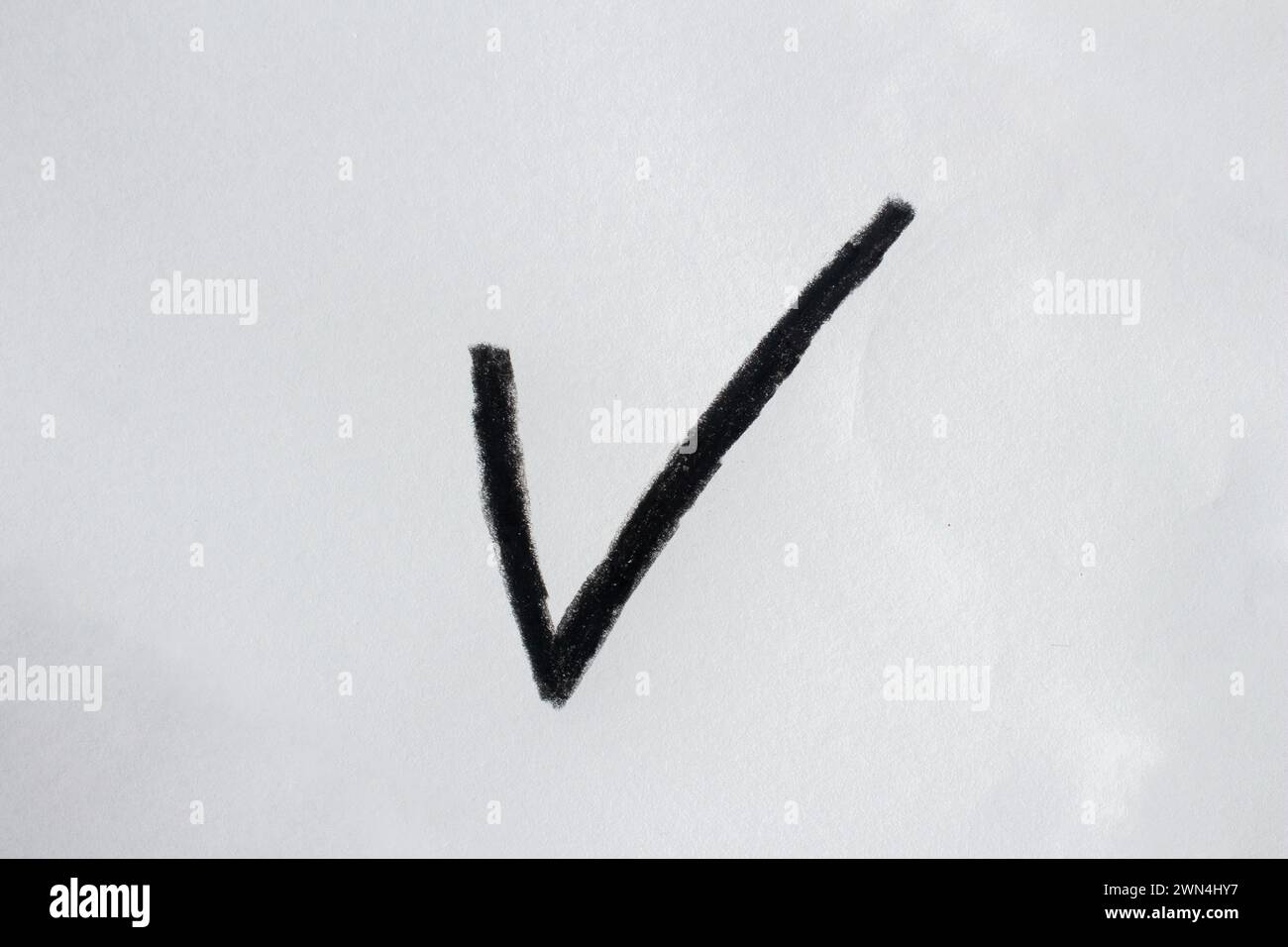 Hand drawn black check mark on white paper Stock Photo - Alamy