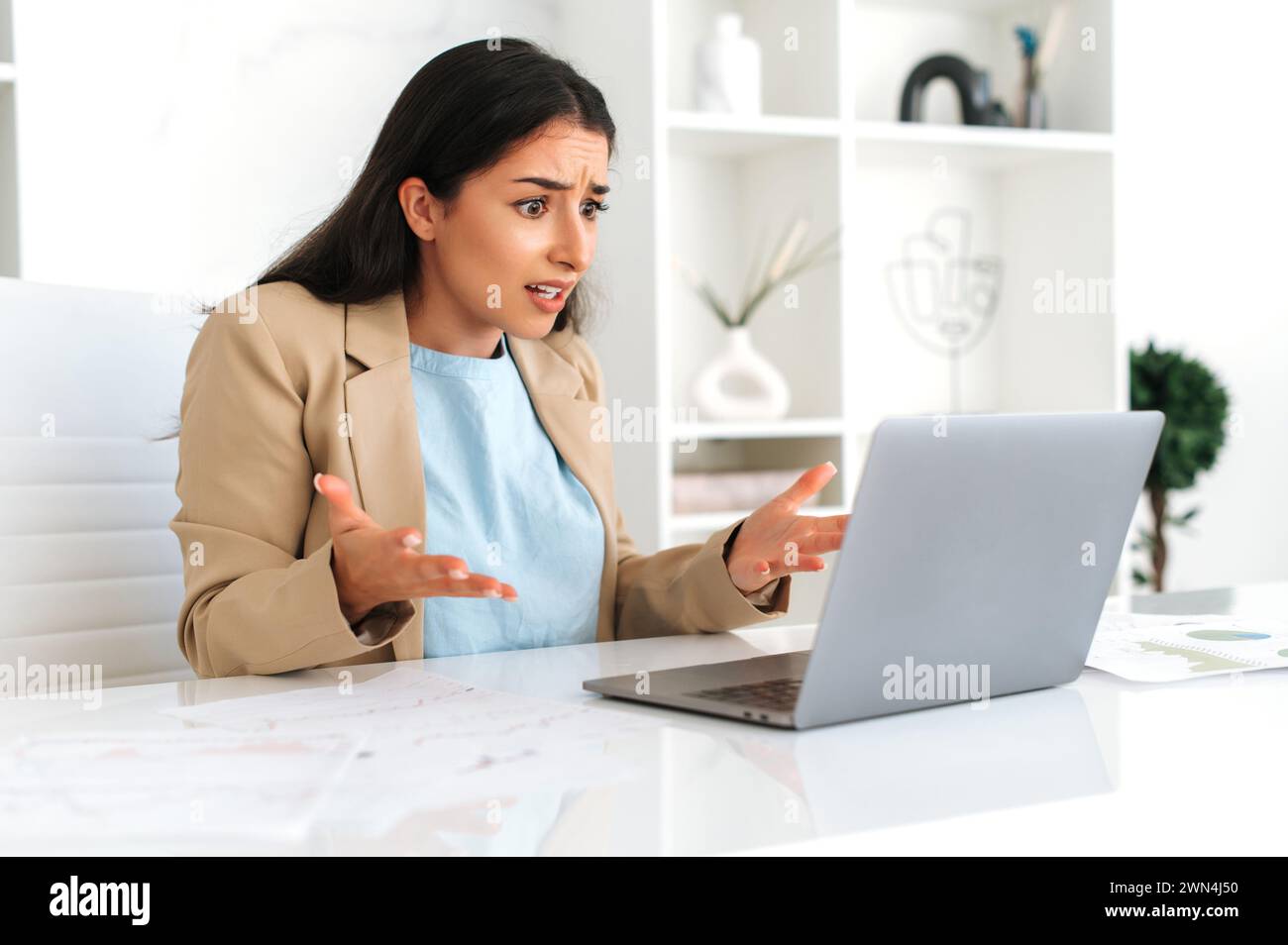 Worried woman investor laptop hi-res stock photography and images - Alamy
