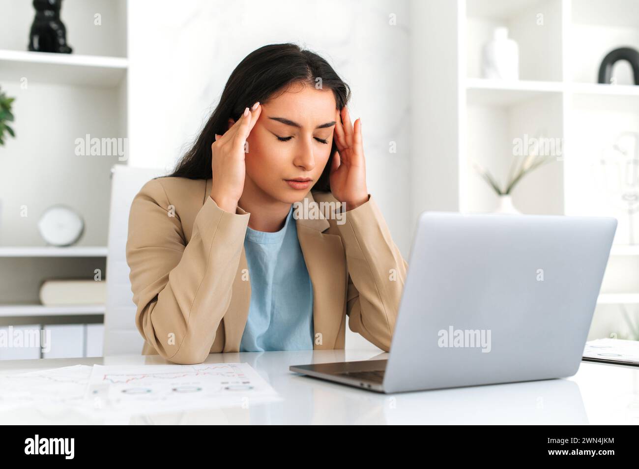 Tired woman.Exhausted overworked arabian or indian business woman ...