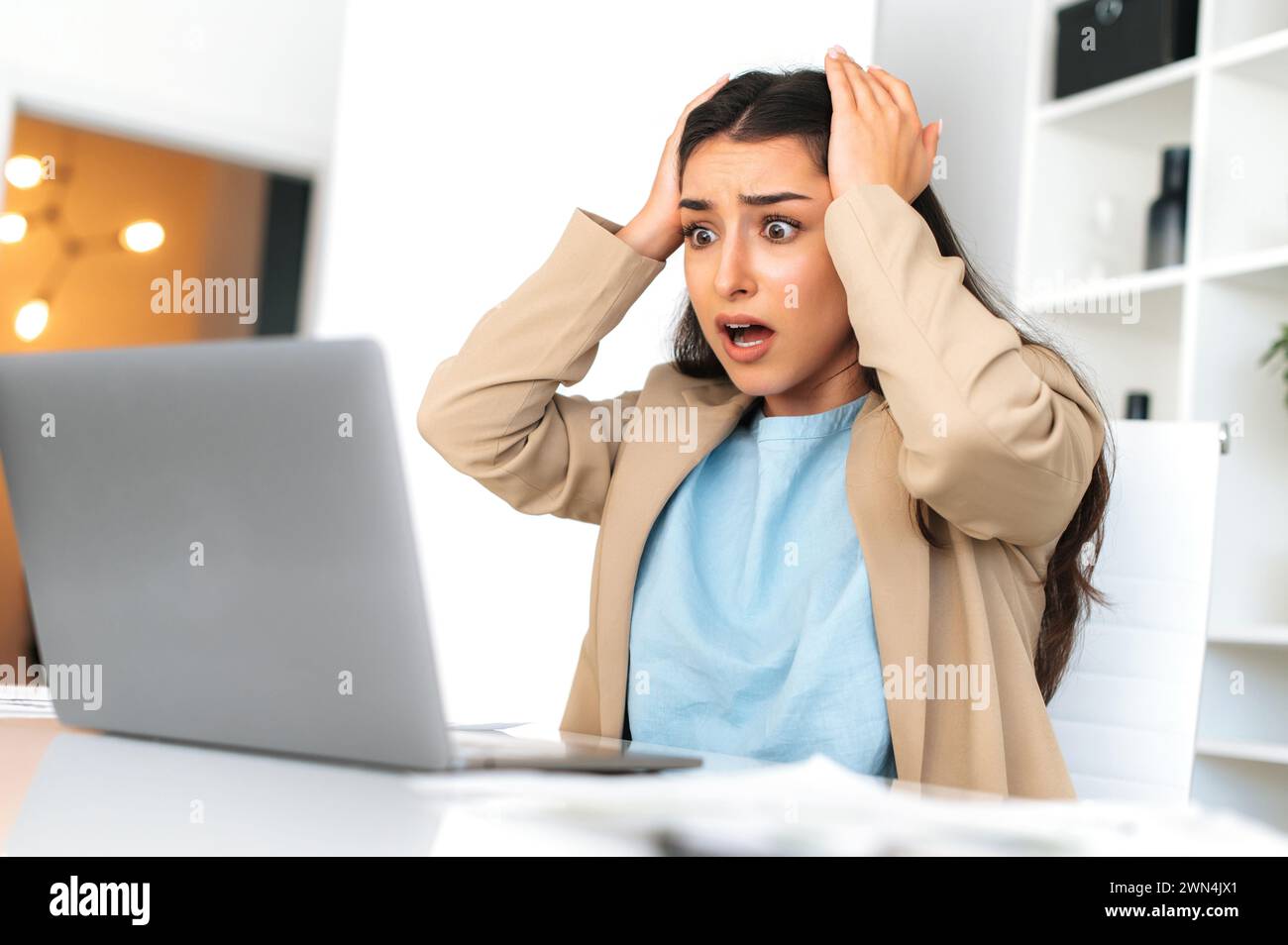 Shocking information. Stressed indian or arabian business woman ...