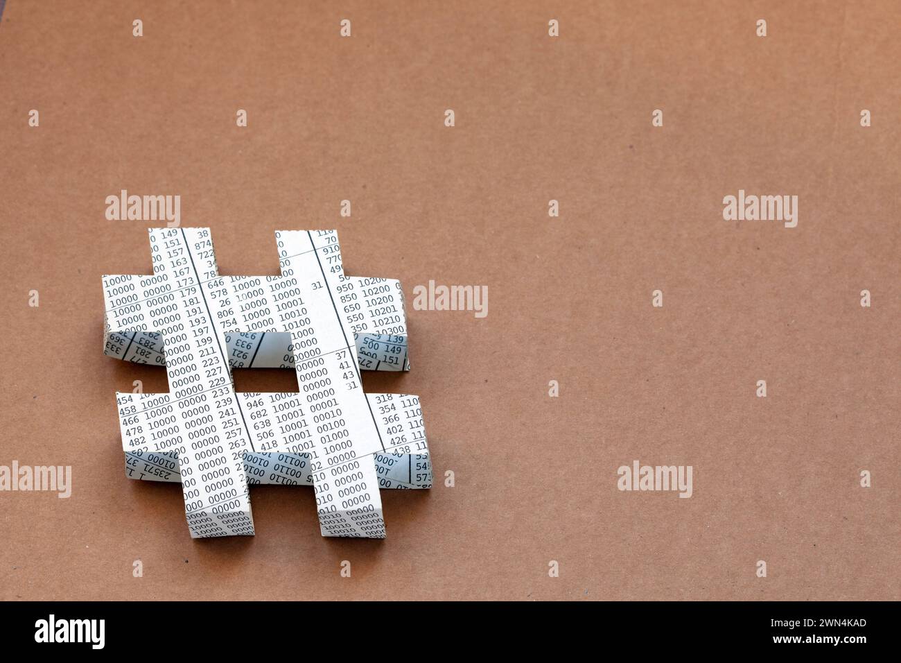 paper hashtag symbol on cardboard background Stock Photo - Alamy
