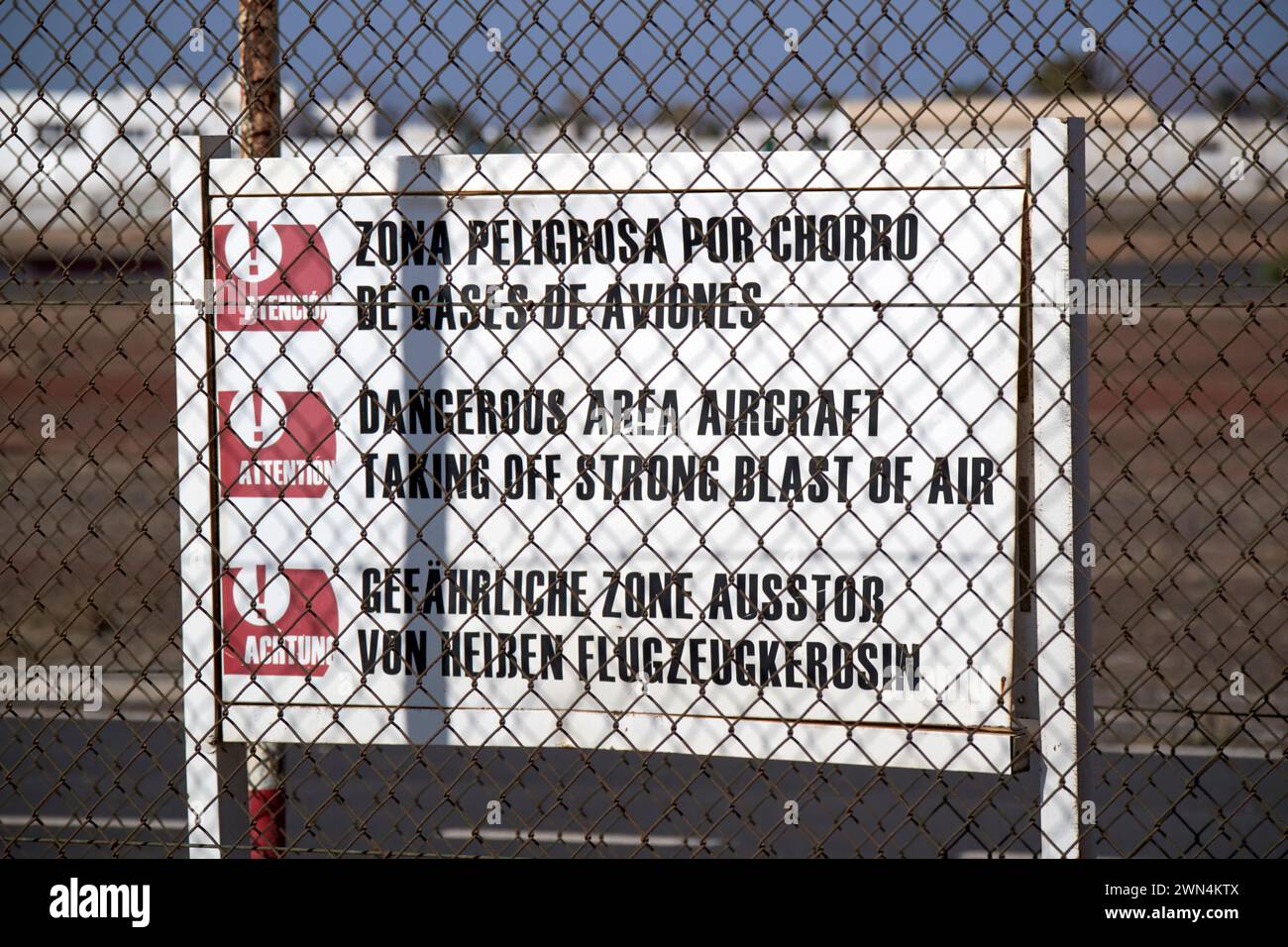 aircraft blast take off warning signs on the perimeter fence of ...
