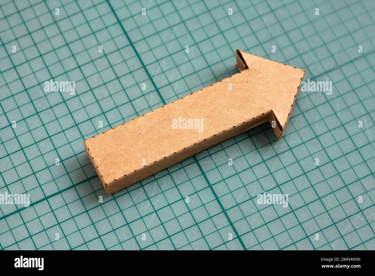 real life 3d arrow cardboard model - design template Stock Photo - Alamy