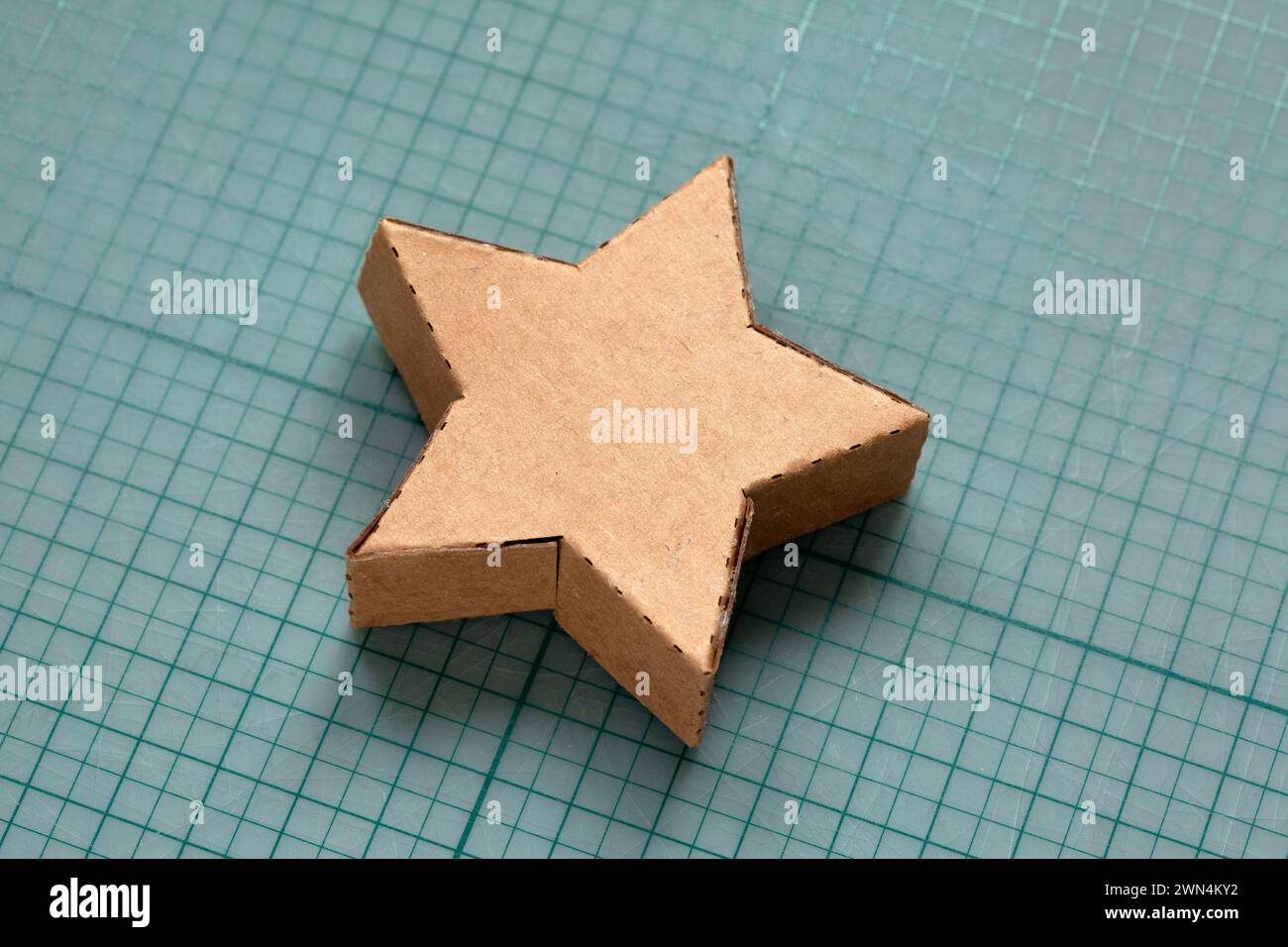 real 3d cardboard star shape box - design template Stock Photo - Alamy