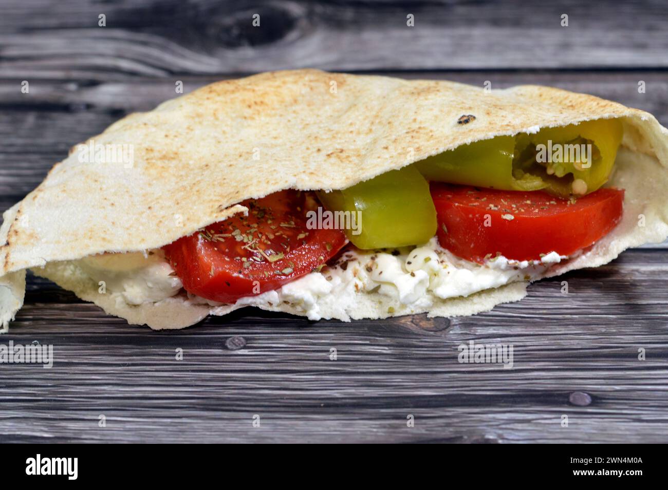 Traditional Shami flat bread made of wheat and flour stuffed with white ...