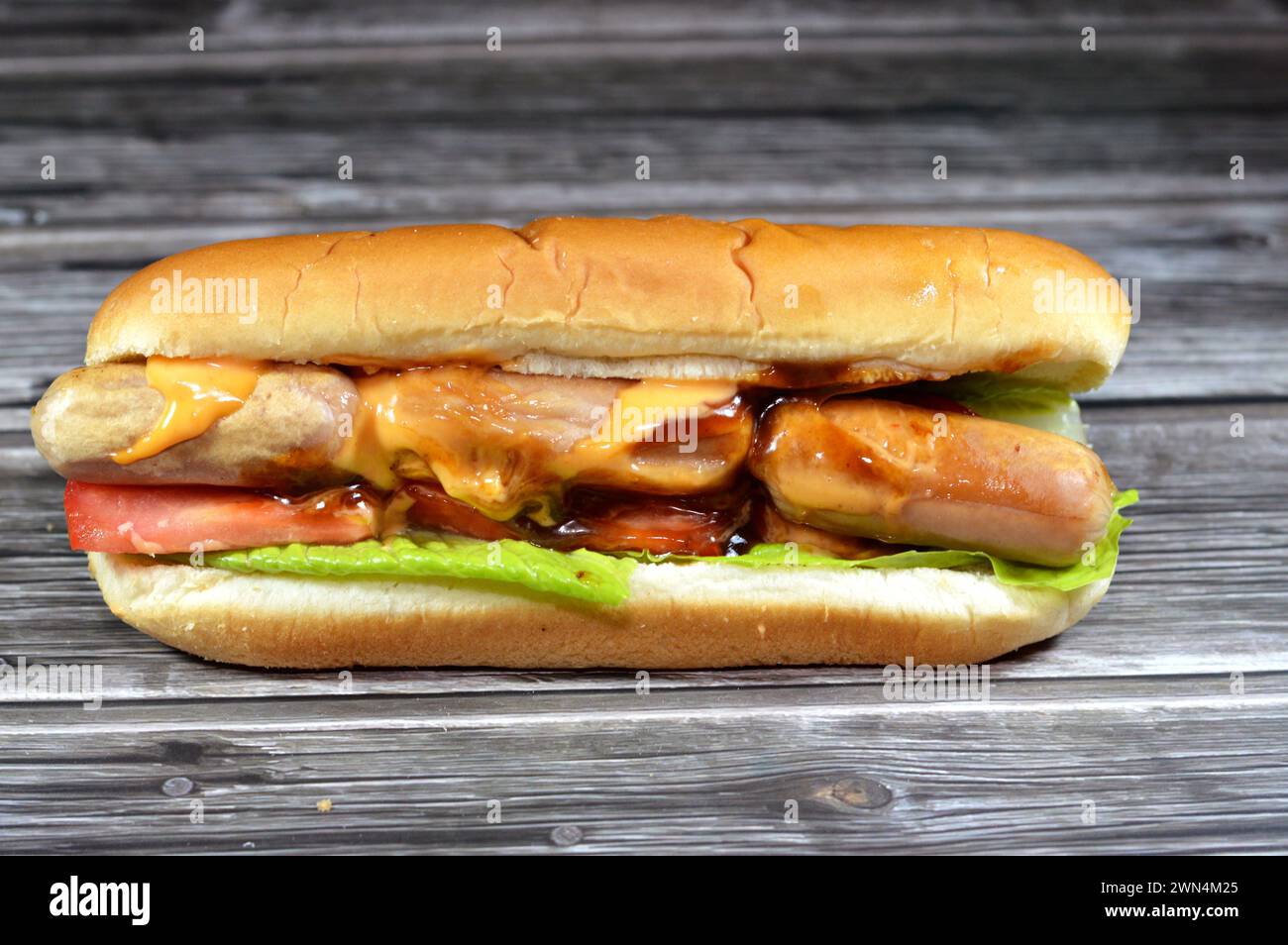 chicken hot dog with thousand island dressing sauce of ketchup ...