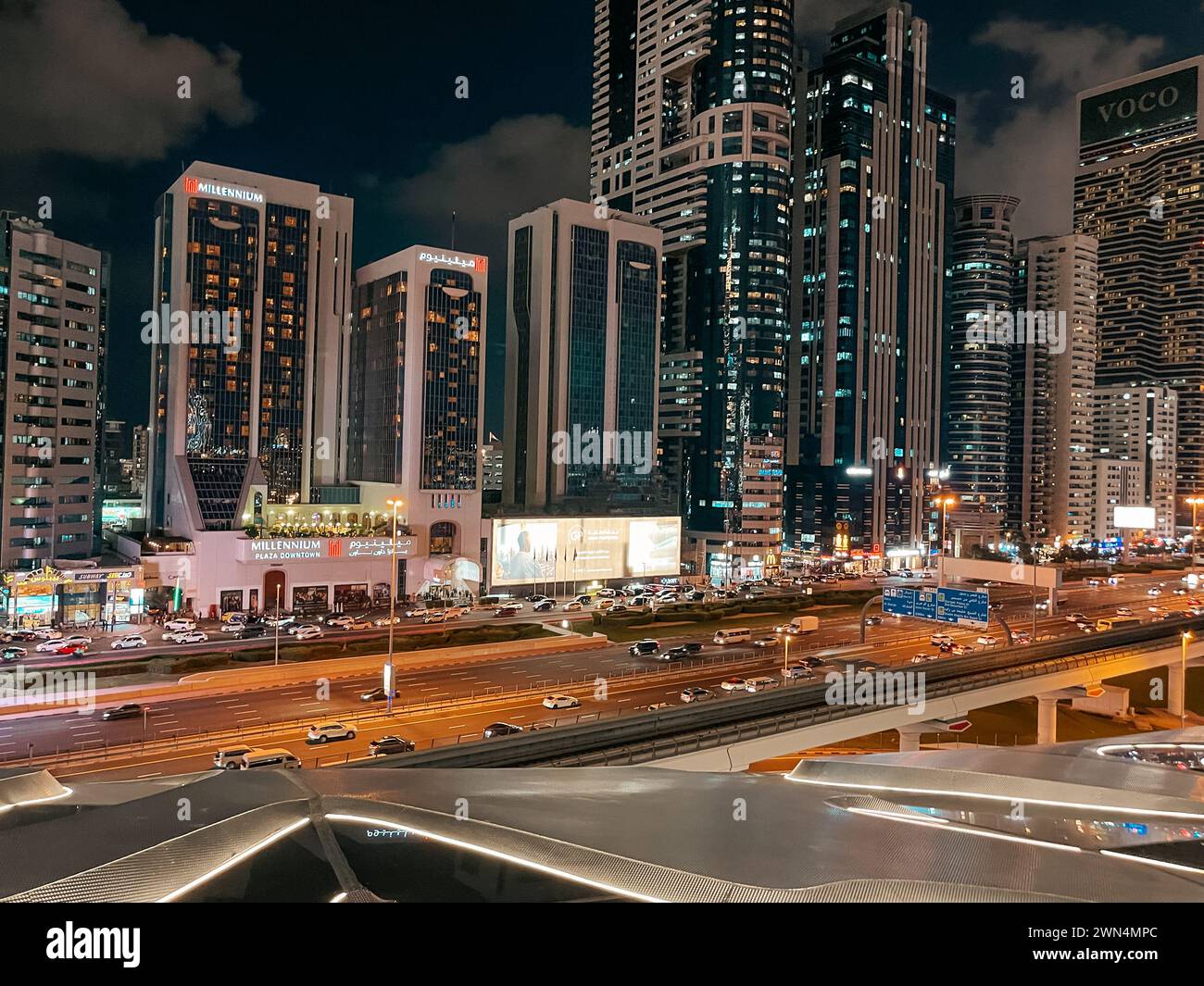 Aerial view at night of the iconic Sheikh Zayed road Skyscrapers and ...