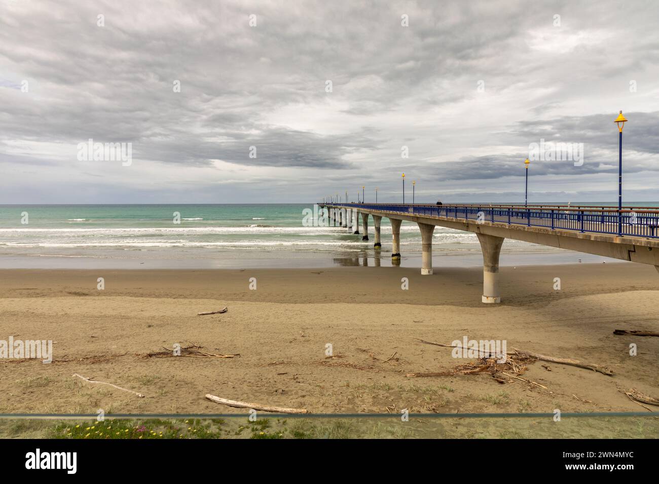 The New Brighton pier in Christchurch, New Zealand, looking out toward ...