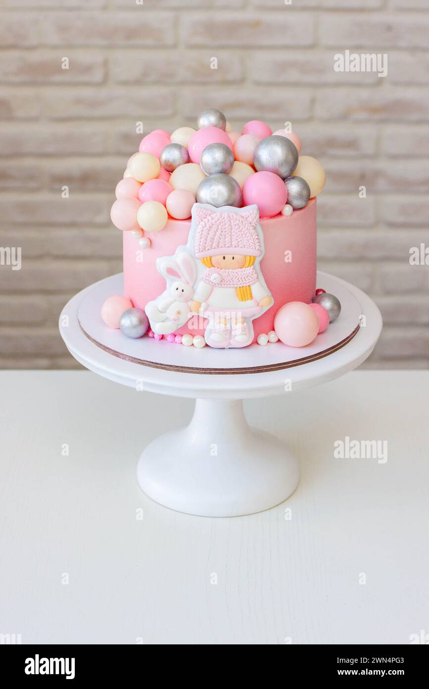 Cute gradient birthday cake with gingerbread little girl and bunny ...