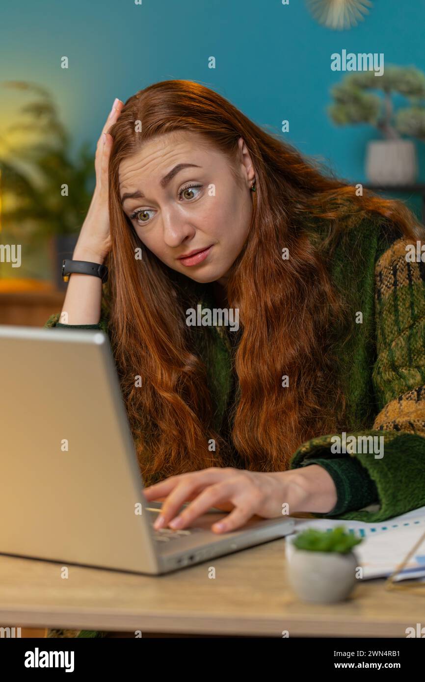 Frustrated woman having software problems with laptop angry girl get ...