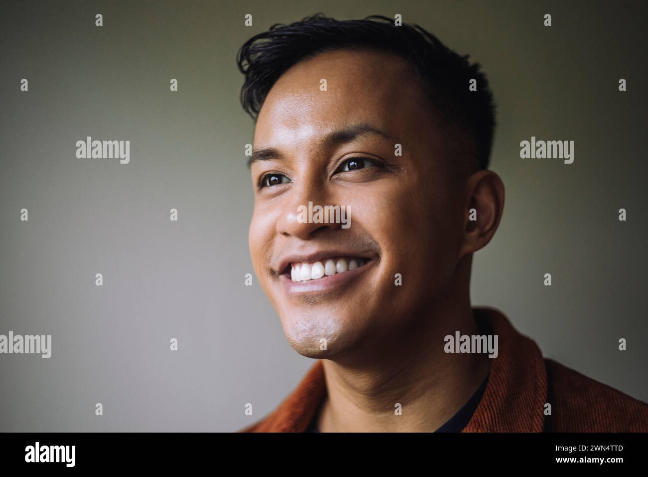 Smiling asian man home hi-res stock photography and images - Alamy