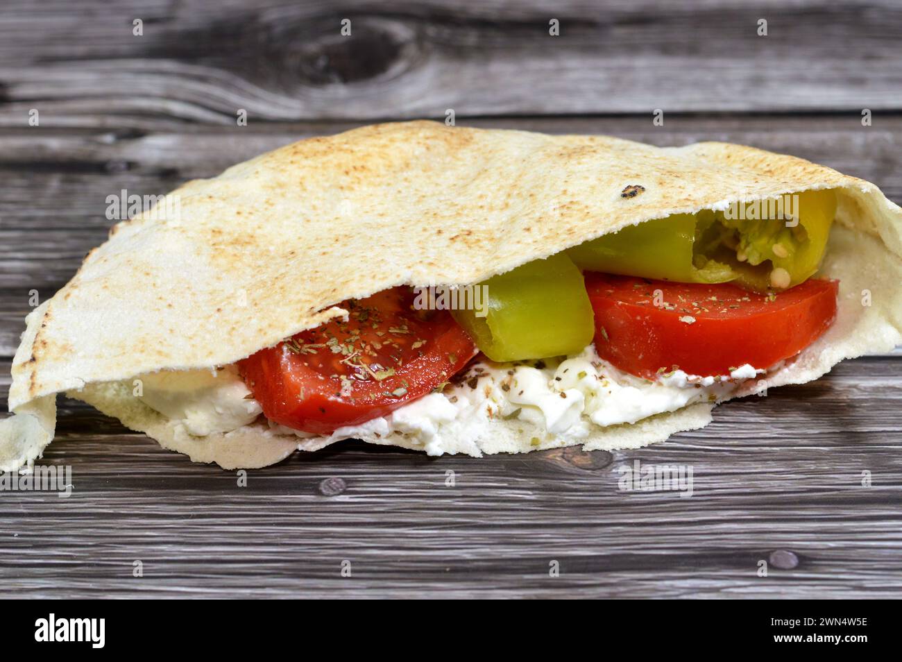 Traditional Shami flat bread made of wheat and flour stuffed with white ...