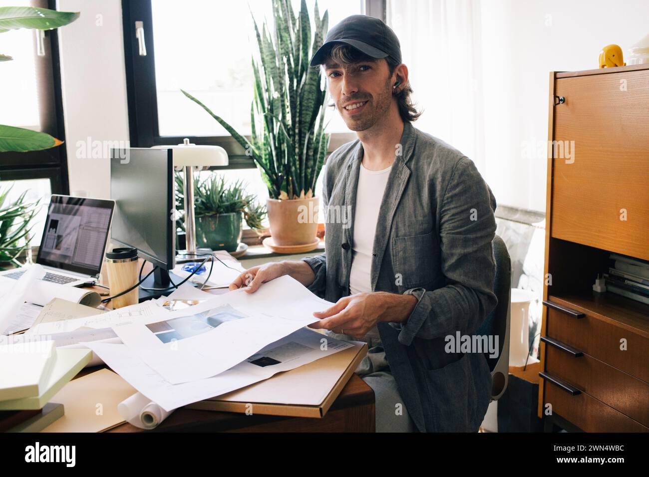 Business portrait architect sitting hi-res stock photography and images ...