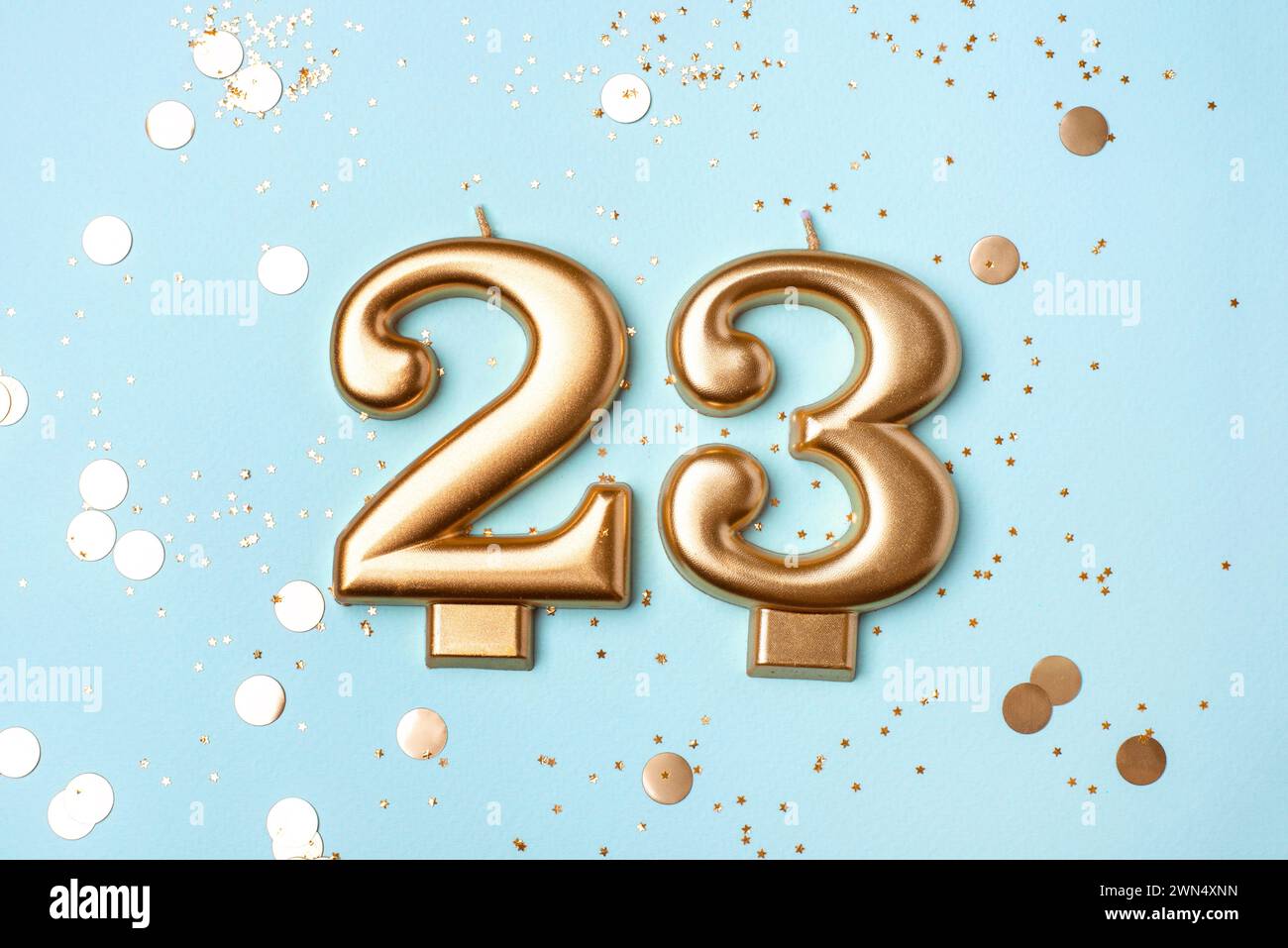 23 years celebration. Greeting banner. Gold candles in the form of ...