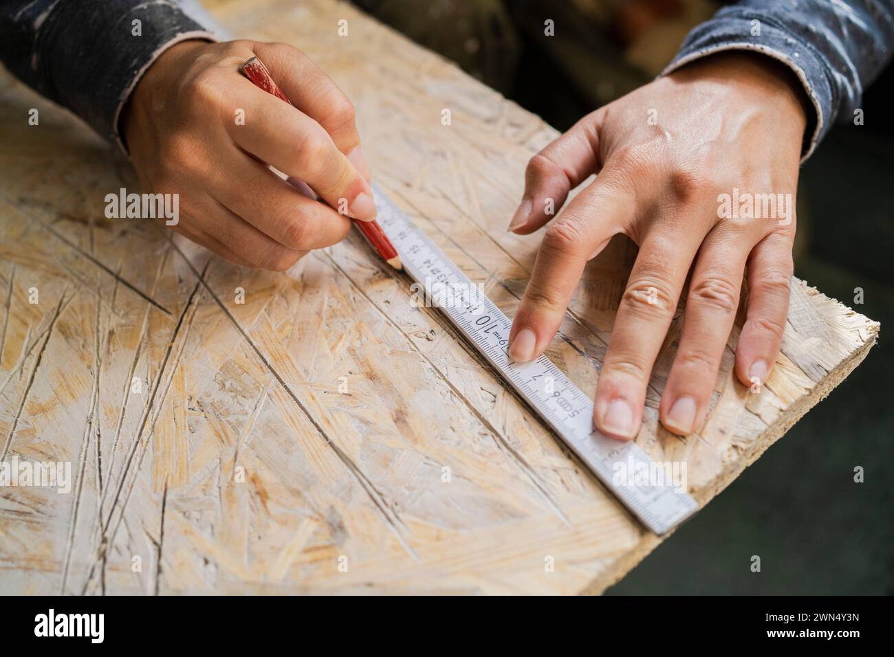Female carpenter marking on hi-res stock photography and images - Alamy