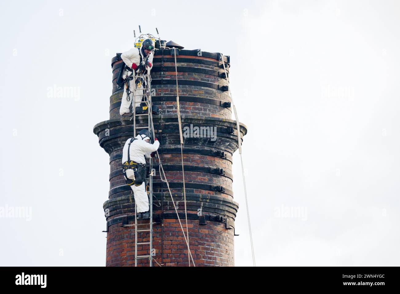 01/04/22 Steeplejacks scale the 43 metre-high Milford Mill chimney to maintain and make the ...