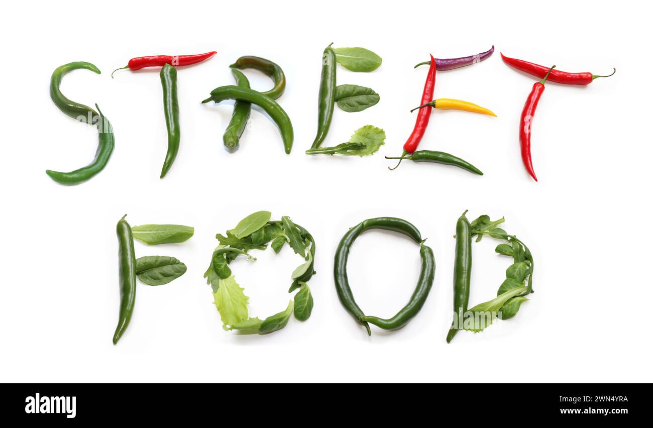 word STREETFOOD from green yellow purple red chili peppers and salad ...