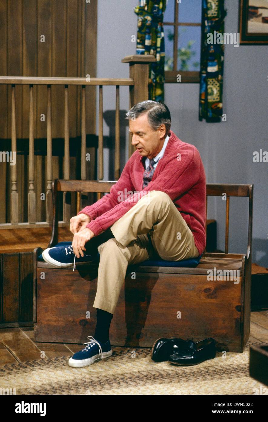 FRED ROGERS OF PUBLIC TV'S "MISTER ROGERS' NEIGHBORHOOD" FITTING HIS ...