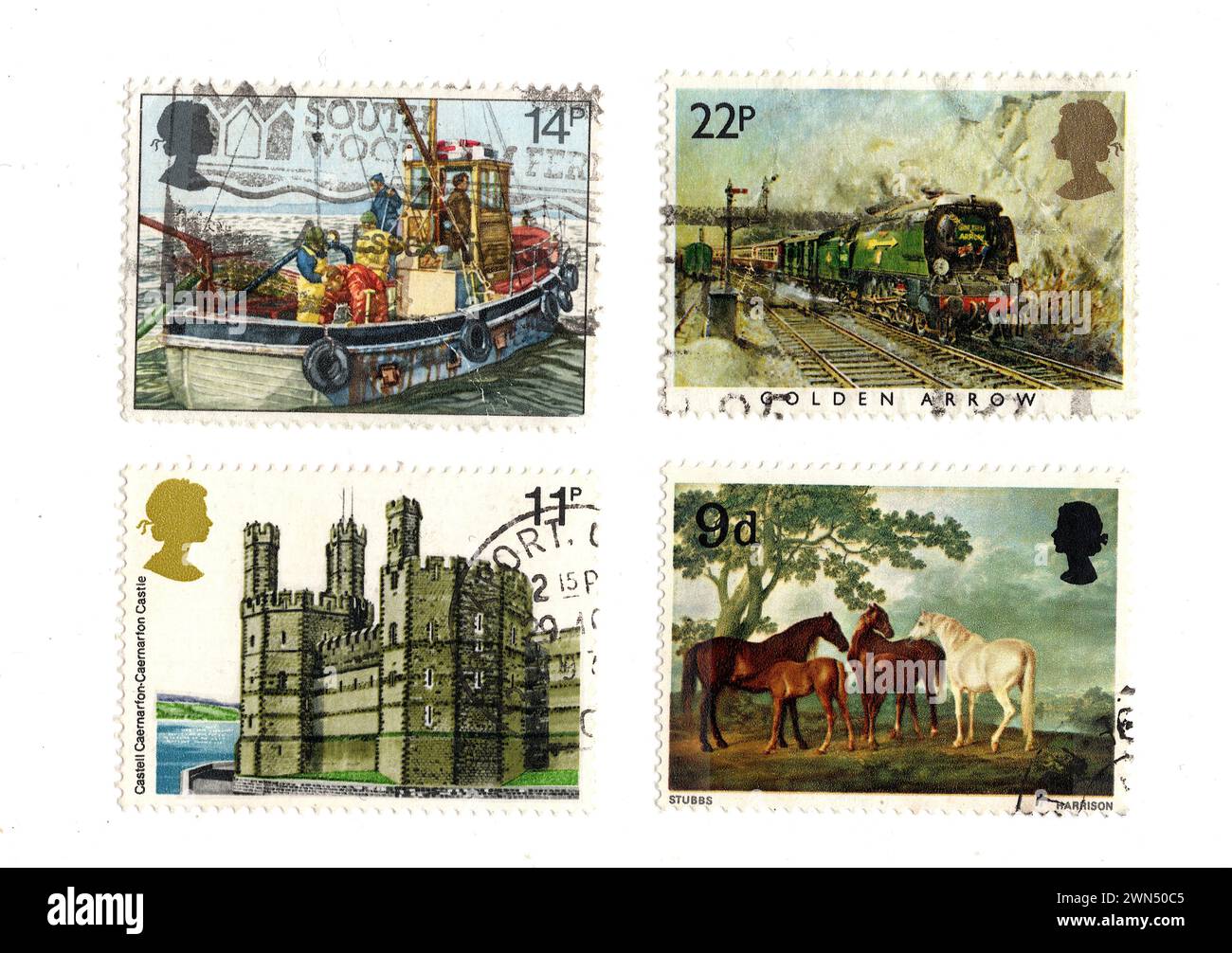 Vintage postage stamps from the United Kingdom isolated on a white ...