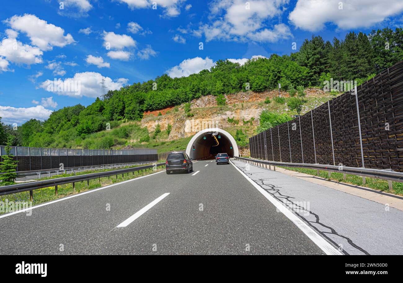 Tunnel on a highway Stock Photo - Alamy