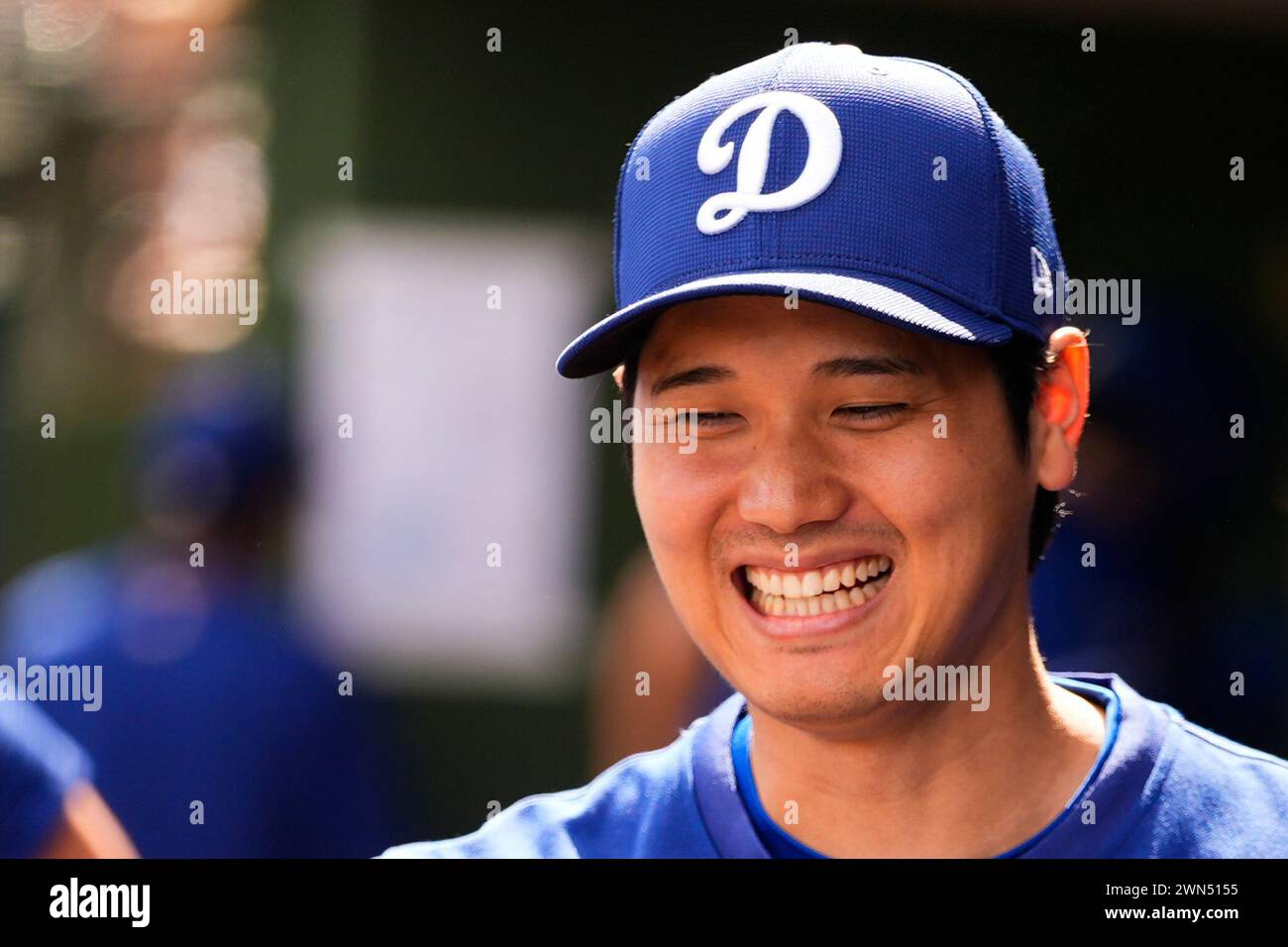 Los Angeles Dodgers designated hitter Shohei Ohtani smiles in the ...