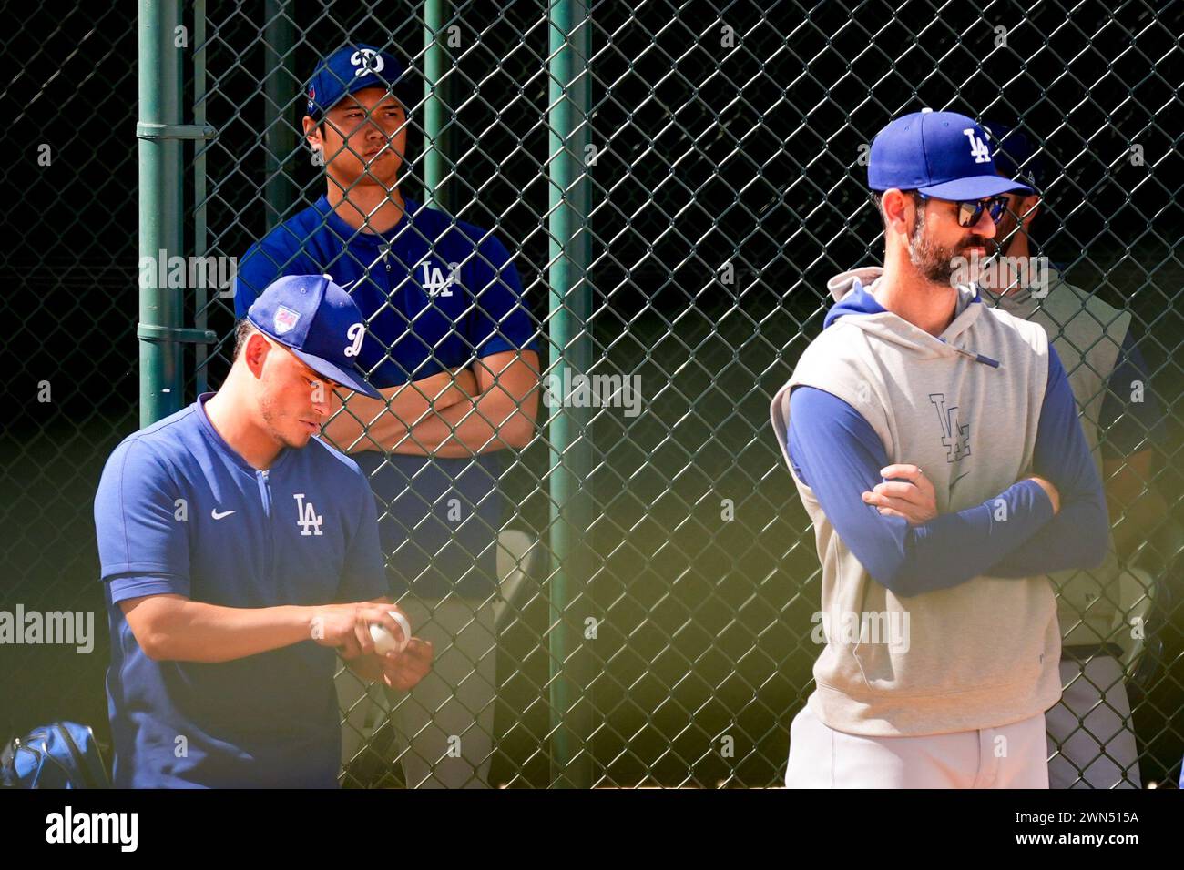 Los Angeles Dodgers designated hitter Shohei Ohtani stands behind a ...