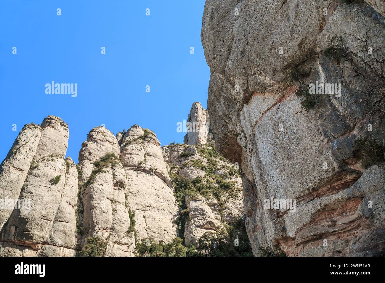 These are the bizarre rocks of the sacred mountain of Montserrat in ...
