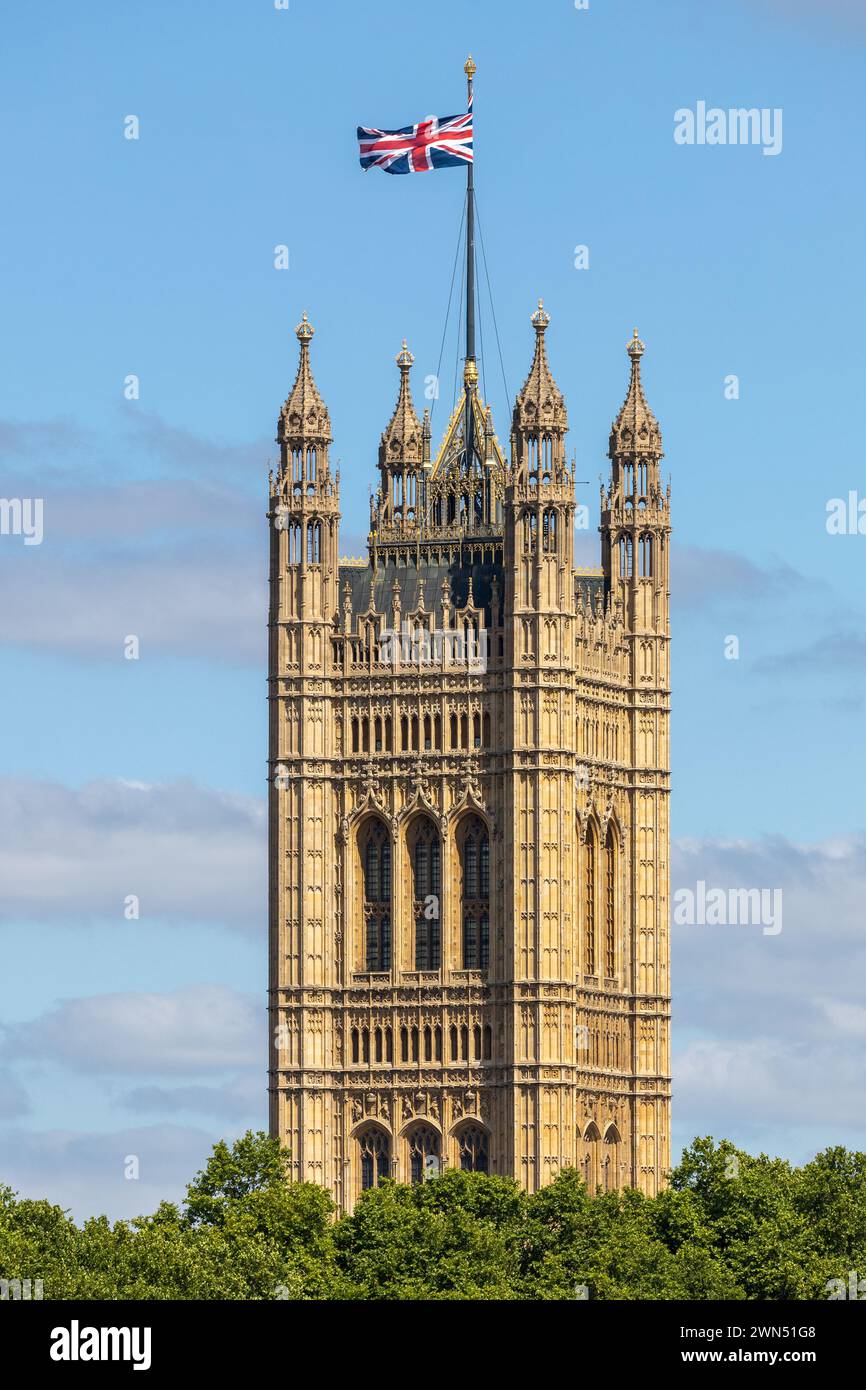 Top of victoria tower with british flag hi-res stock photography and ...