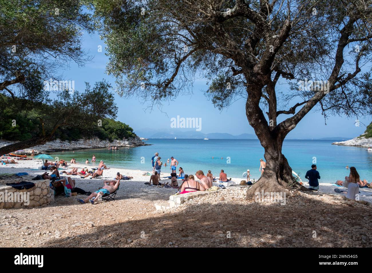 Emplisi Beach, near Fiskardo, Kefalonia, Greece. A sandy beach with a ...