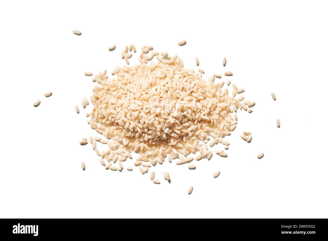 A top view of raw brown and white rice, forming a heap. The integral ...