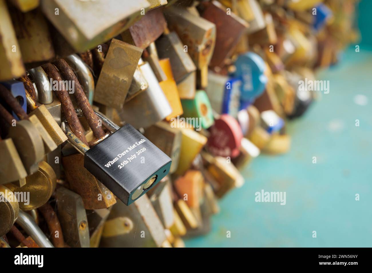 24/03/21 The ‘love lock’ Weir Bridge over the river Wye in Bakewell ...