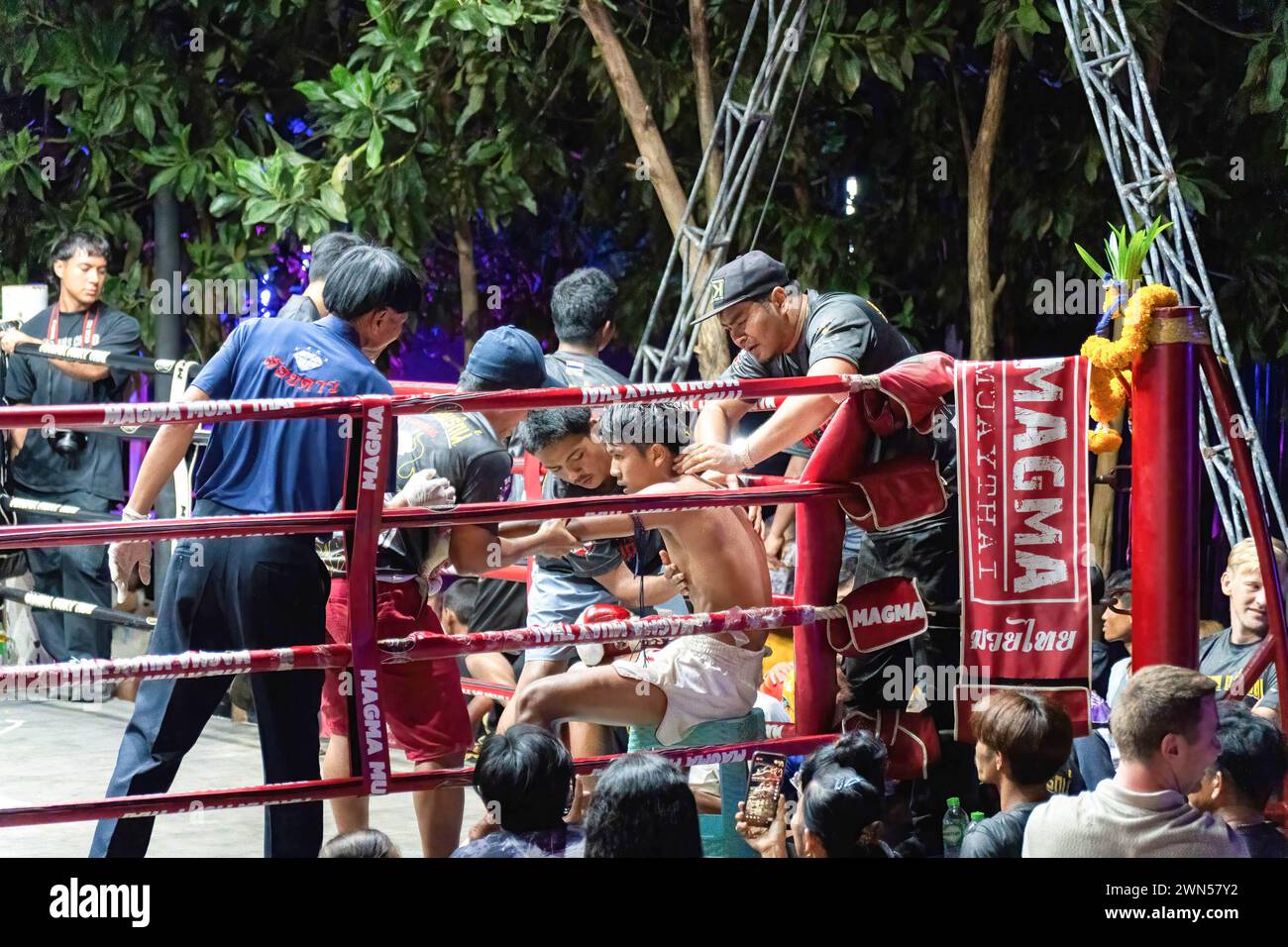 Koh Chang, Thailand. 24th Feb, 2024. The referee is seen close to boxer ...