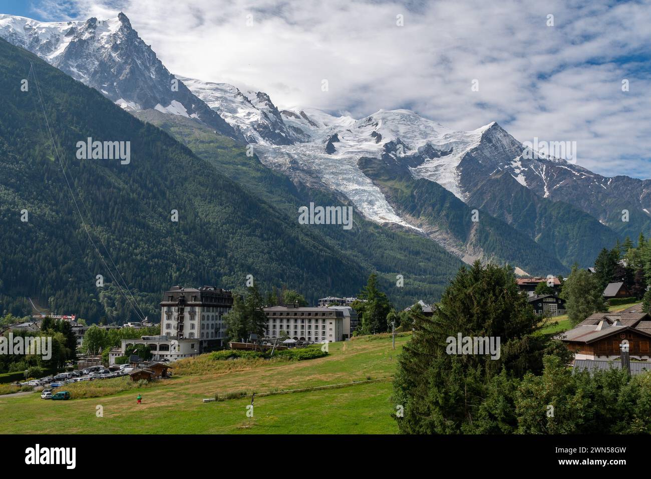 View of the alpine town, popular tourist destination at the foot of the Mont Blanc massif, in ...