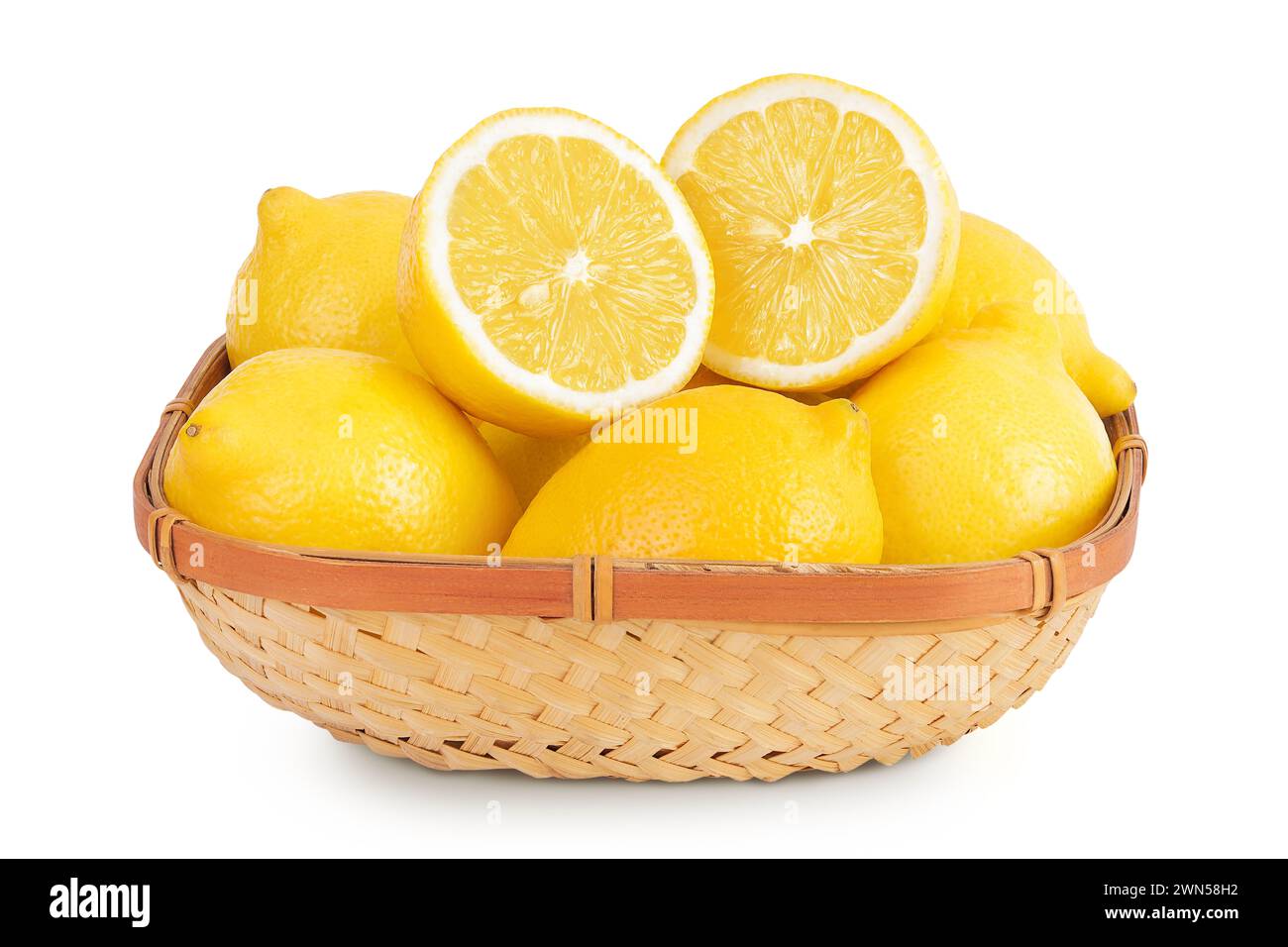 Ripe lemons in wicker basket isolated on white background Stock Photo ...