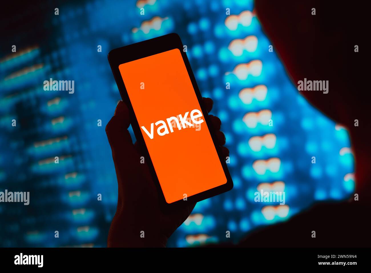In this photo illustration, the Vanke logo is displayed on a smartphone ...