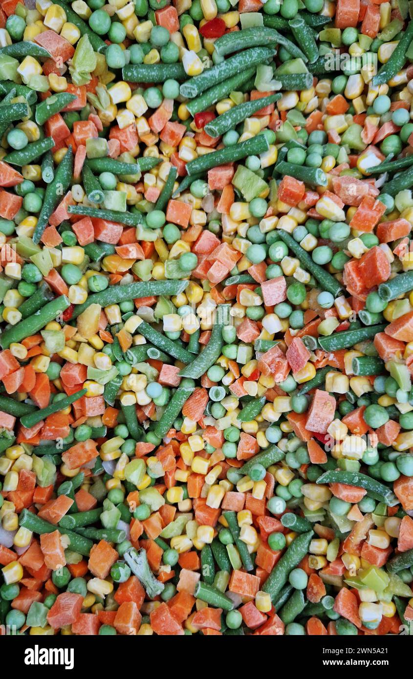 Frozen vegetables in a store, close-up. Mixed vegetables are sold in ...