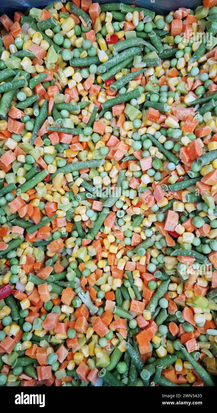 Frozen vegetables in a store, close-up. Mixed vegetables are sold in ...