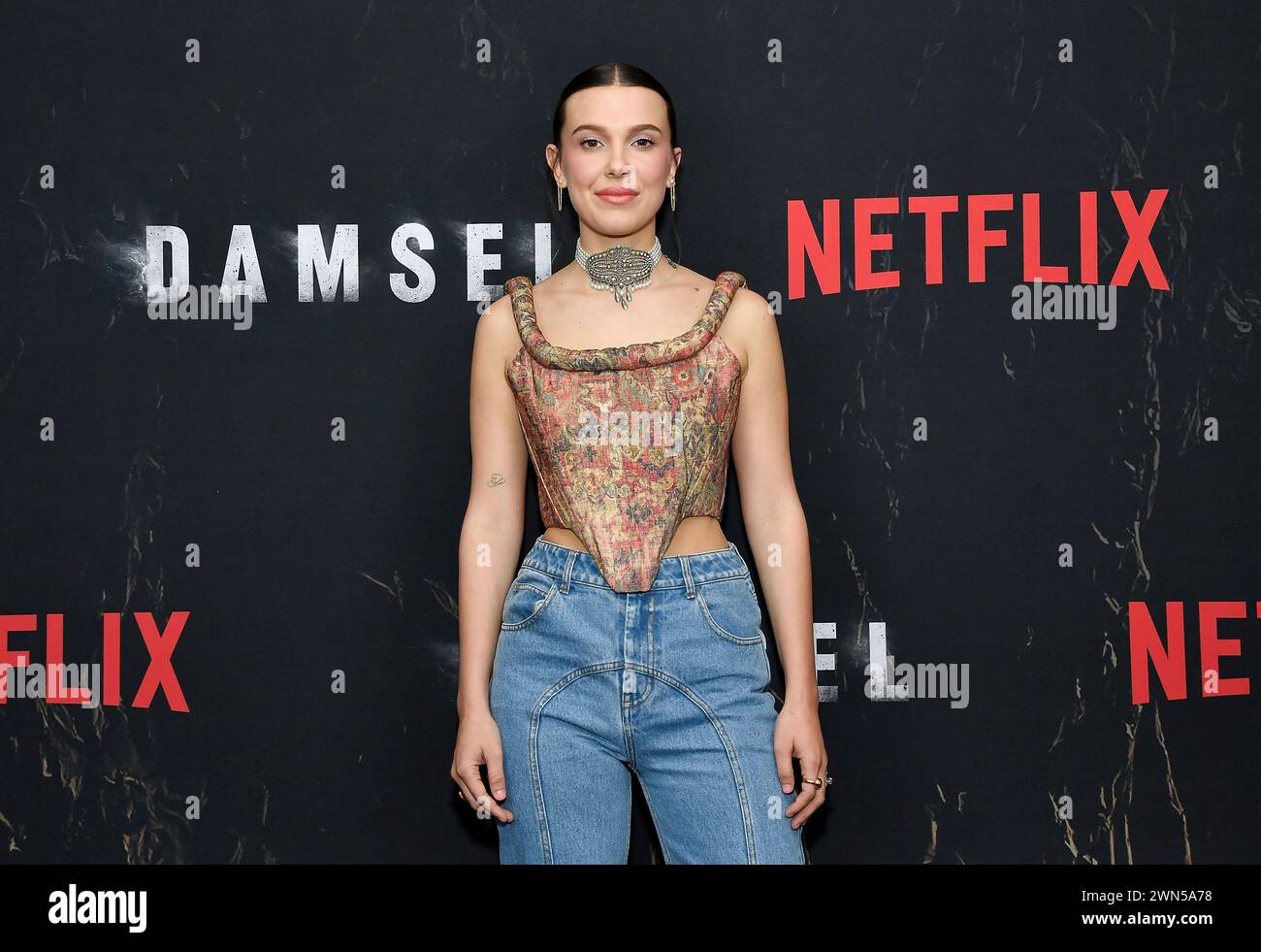 Actor Millie Bobby Brown poses at the Netflix "Damsel" photo call at ...