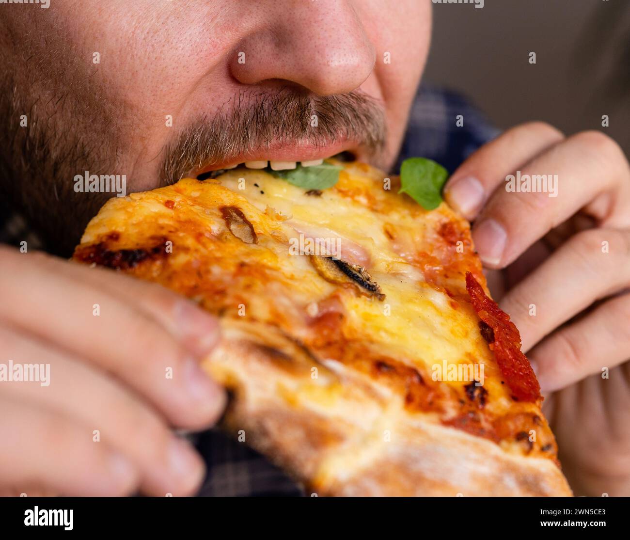 Closeup man eating hi-res stock photography and images - Alamy