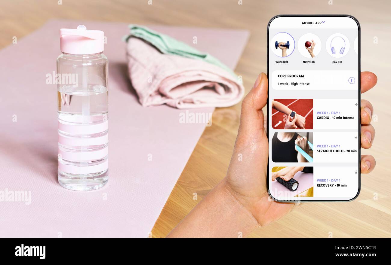 Home workout with sports mobile app. Sports mobile app interface on the ...