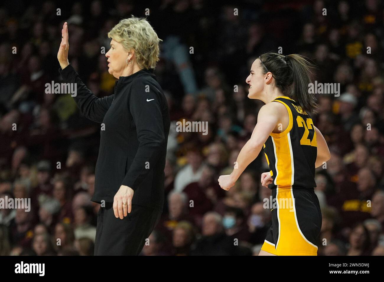 Iowa guard Caitlin Clark, right, celebrates next to head coach Lisa ...