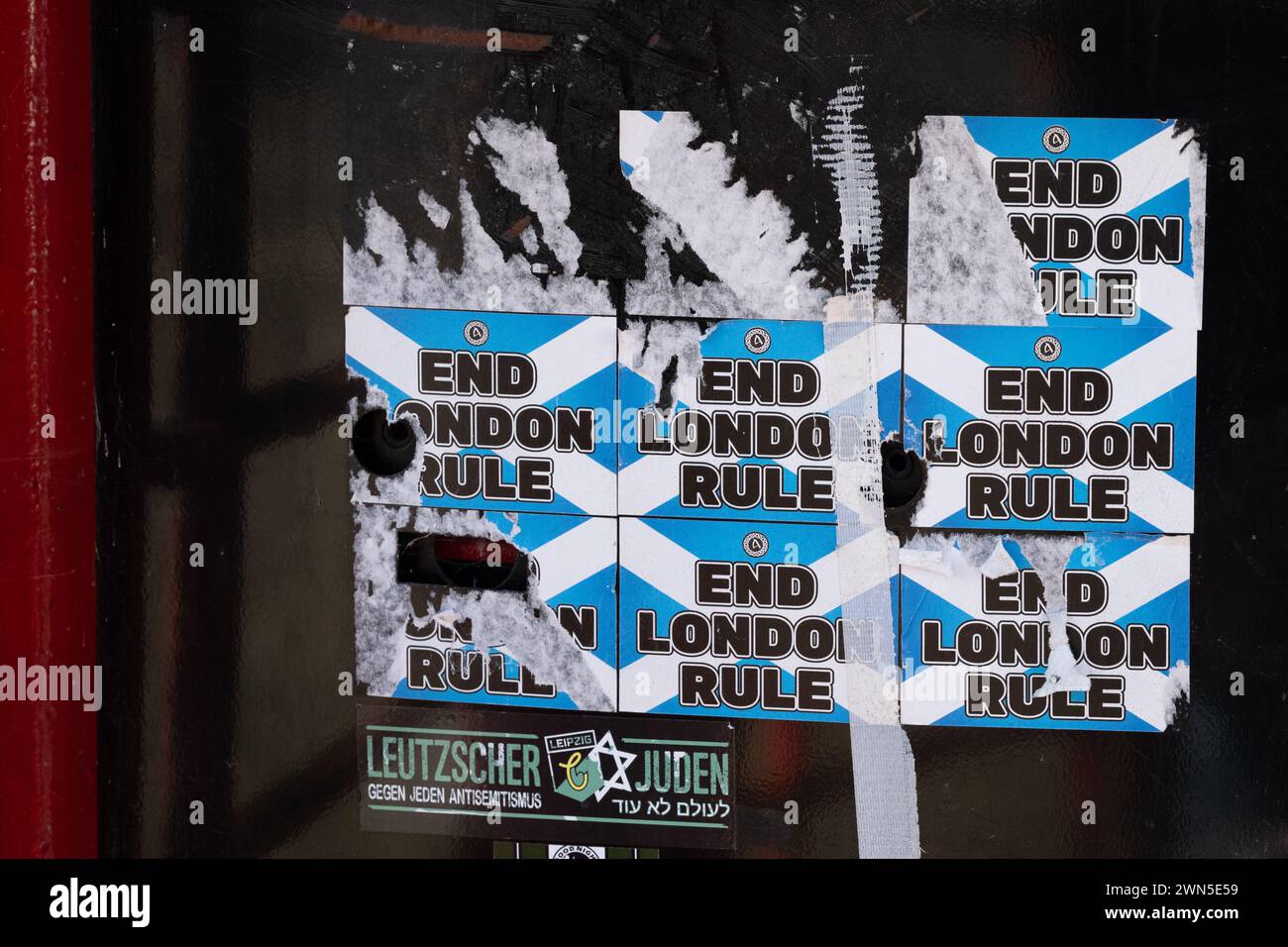 End London Rule stickers in telephone box, Scotland, UK Stock Photo - Alamy