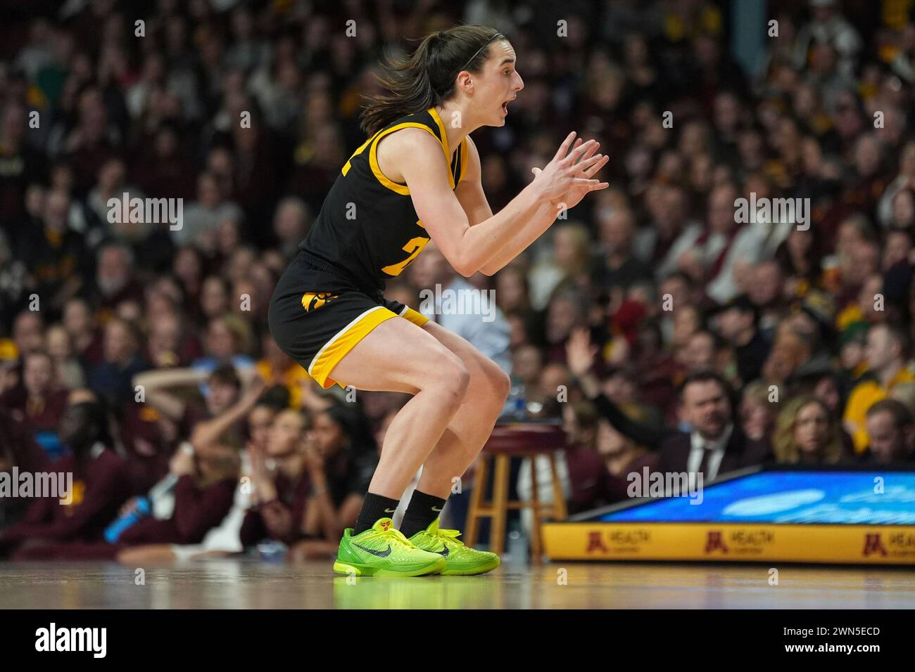 Iowa guard Caitlin Clark reacts toward head coach Lisa Bluder during ...