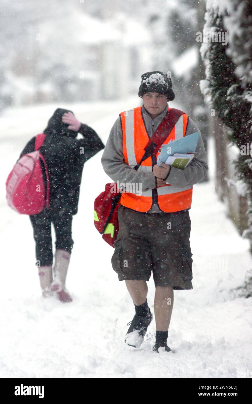 18/12/10 Today Photo ..Laden with Christmas cards, postman, Phil ...
