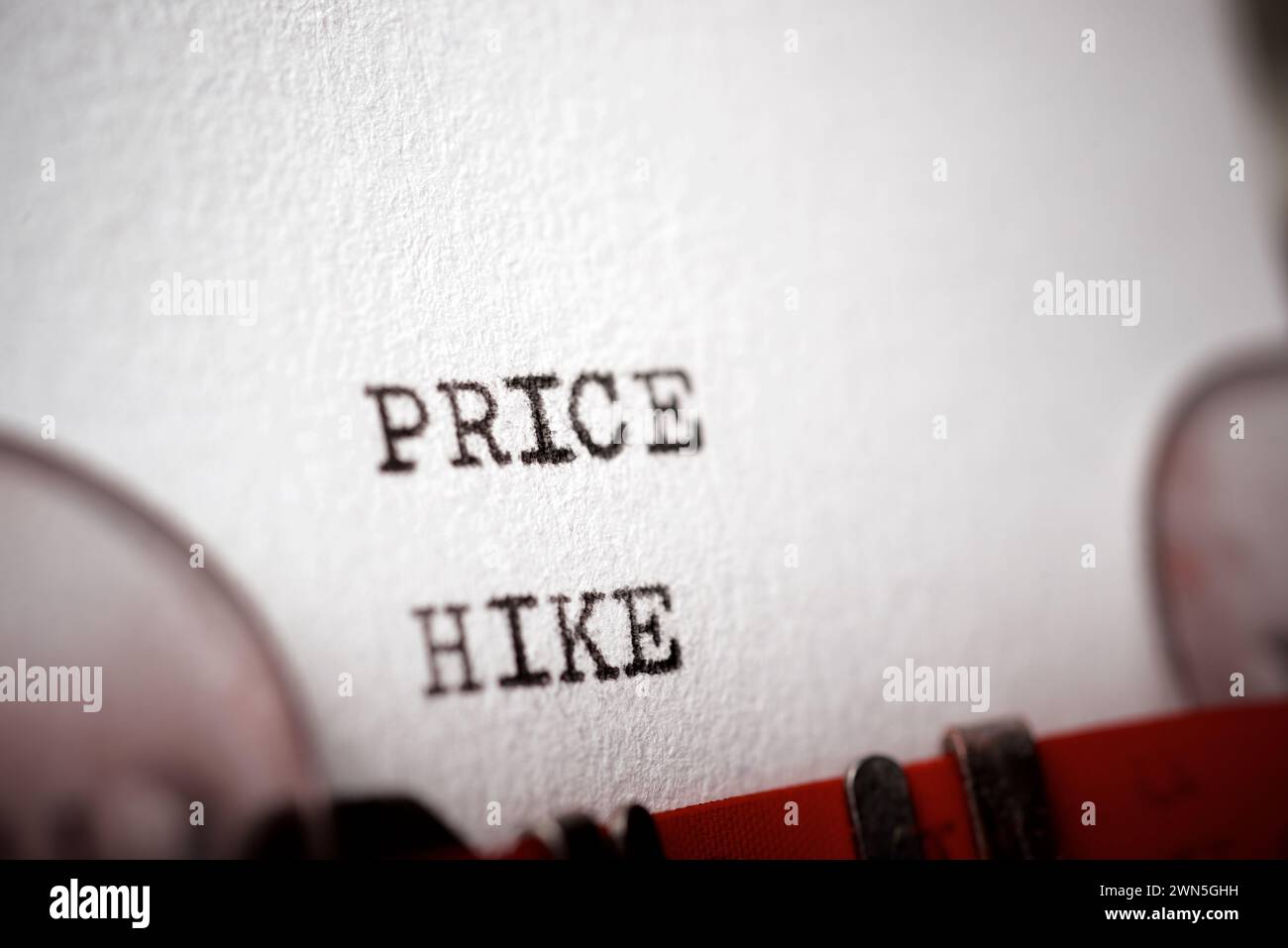 Price hike text written with a typewriter Stock Photo - Alamy