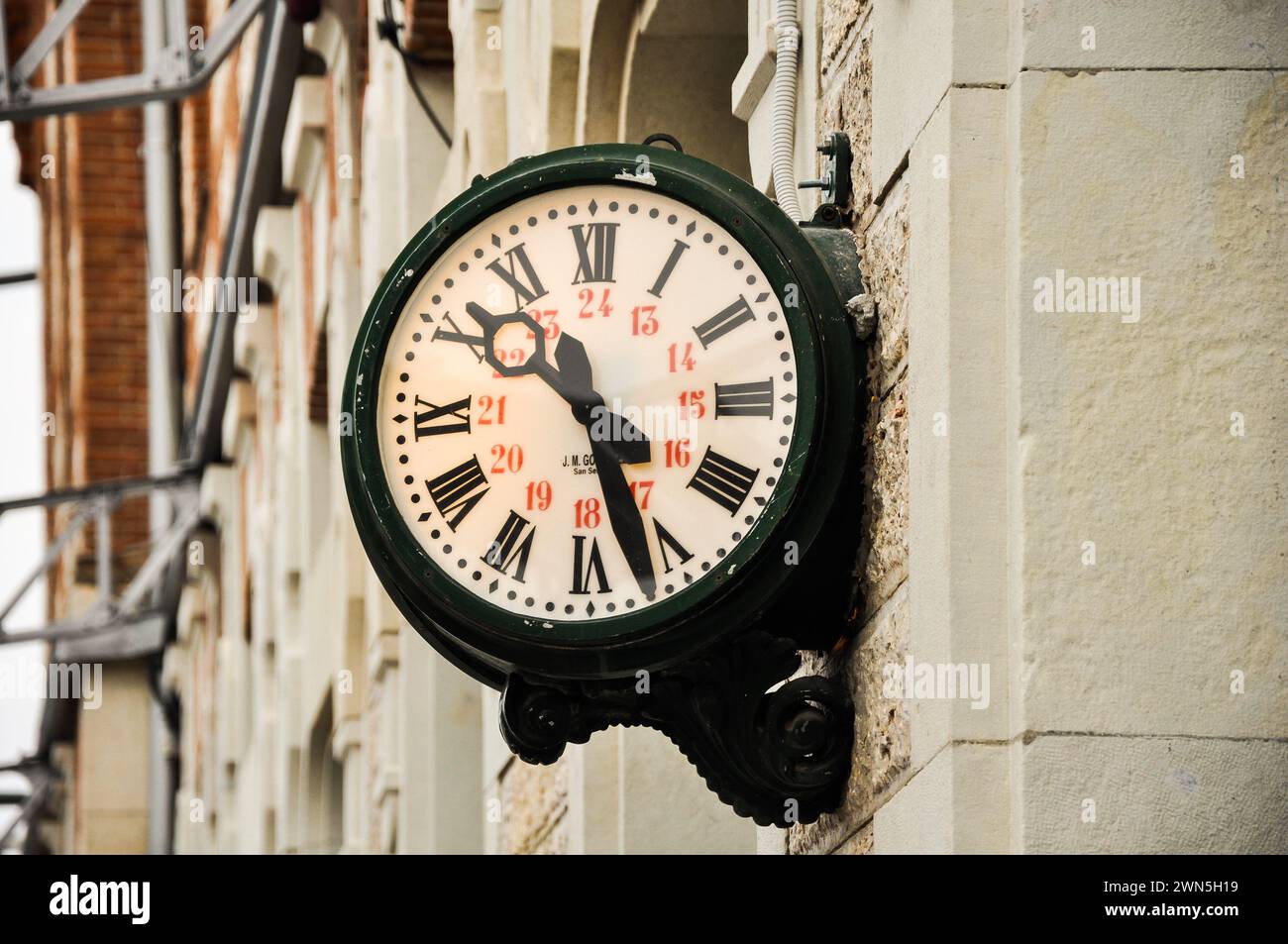 Classical clock with roman numerals from a railway station in Aranjuez ...