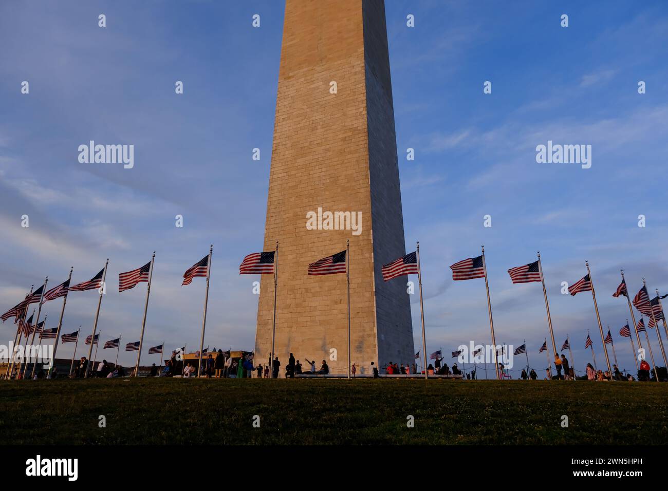 The Washington Monument surrounded by US flags in National Mall ...
