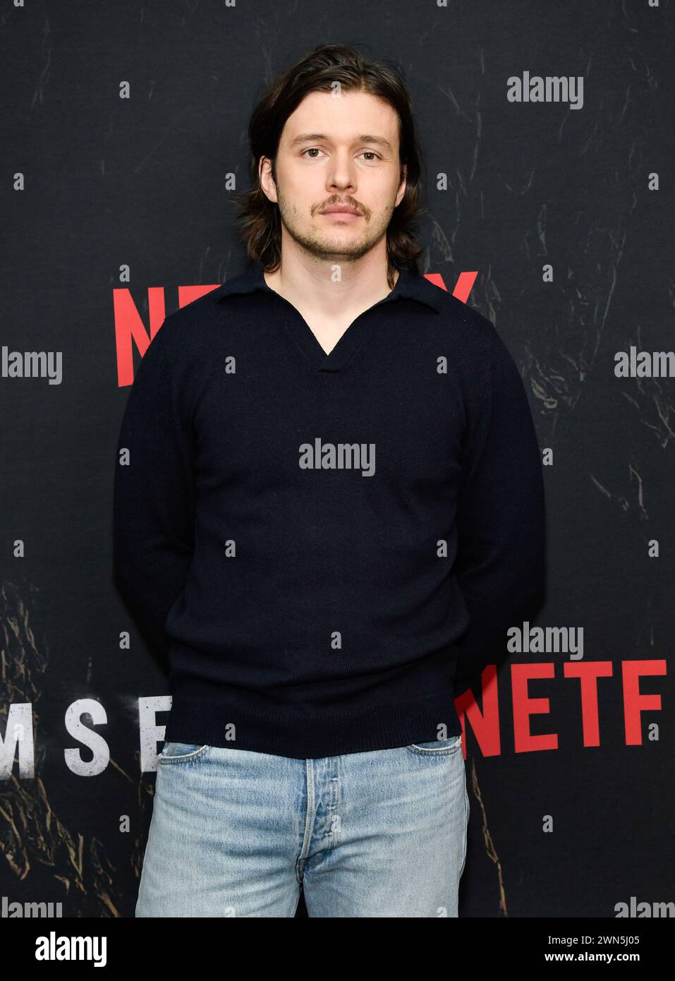 Actor Nick Robinson poses at the Netflix "Damsel" photo call at the ...