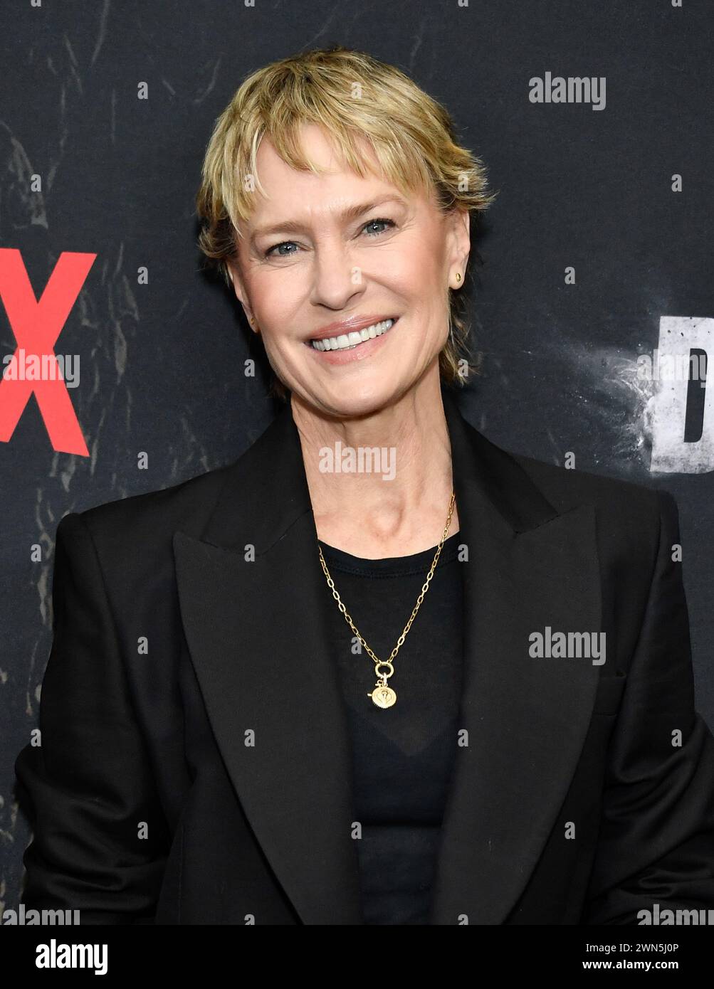 Actor Robin Wright poses at the Netflix "Damsel" photo call at the ...